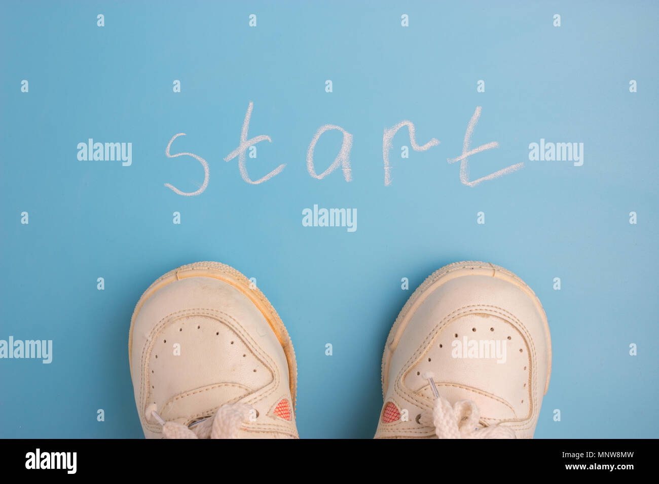 top view image of foot on blue background Stock Photo - Alamy