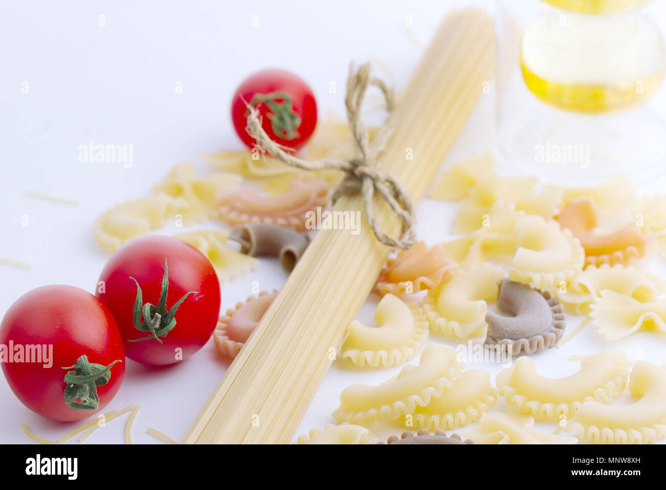 Multi-colored pasta isolated on a white background Stock Photo - Alamy