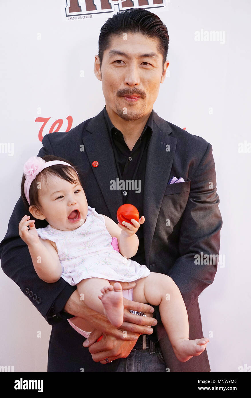 Brian Tee, daughter Madelyn Skyler at The Red Nose Day Special on NBC ...