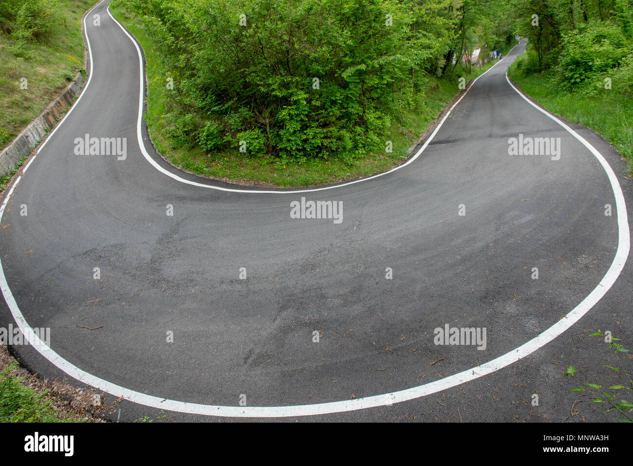 road with mountain curves Stock Photo - Alamy