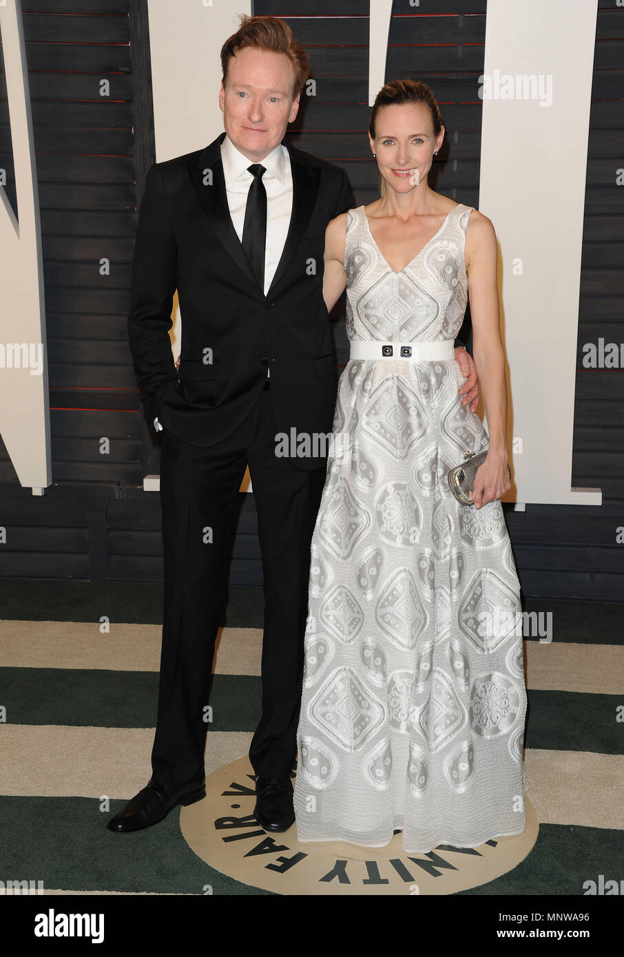 Conan O Brien and wife arriving at the Vanity Fair's Oscar Party 2016 ...