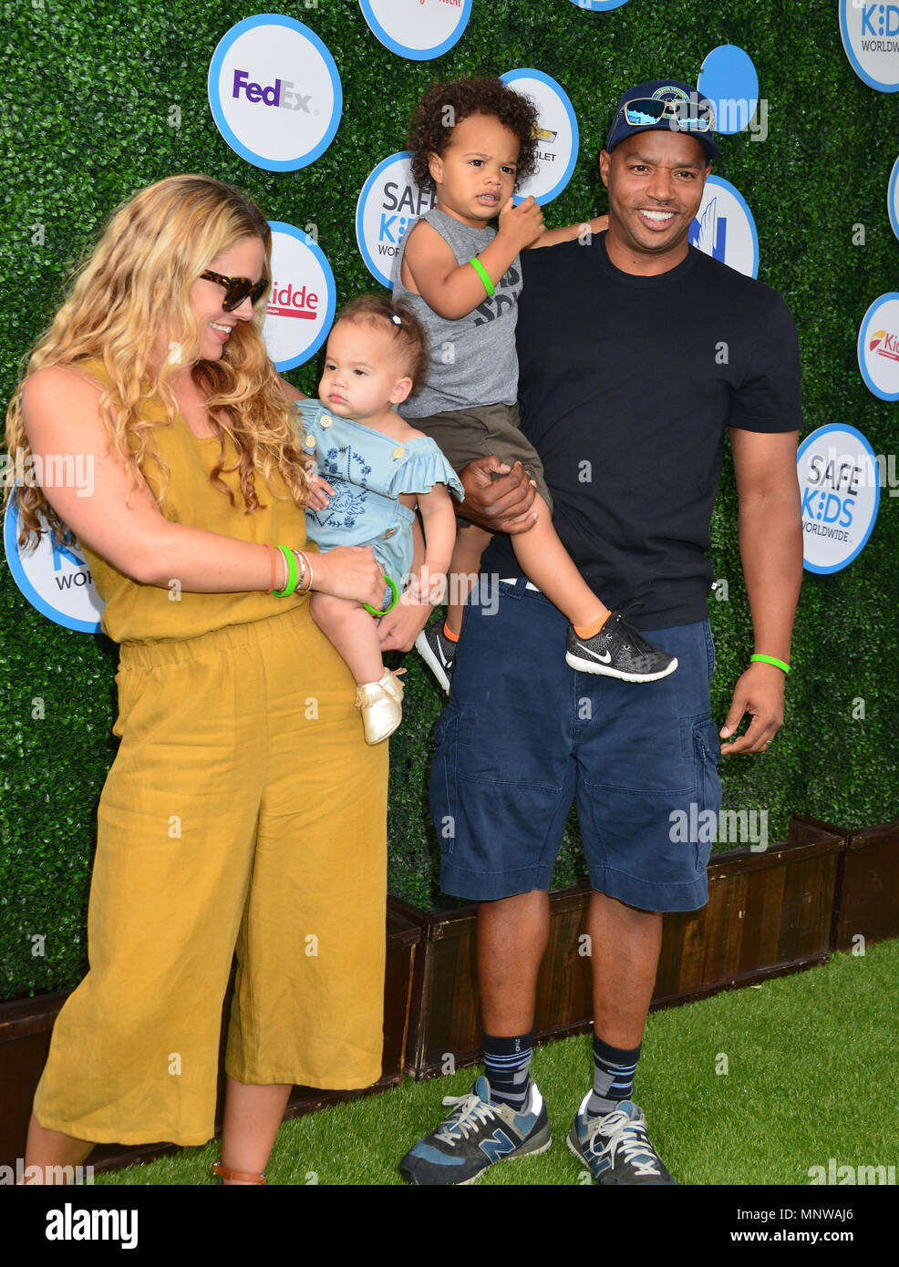 Donald Faison, wife Cacee Cobb + kids at the Safe Kids Day at Smashbox ...