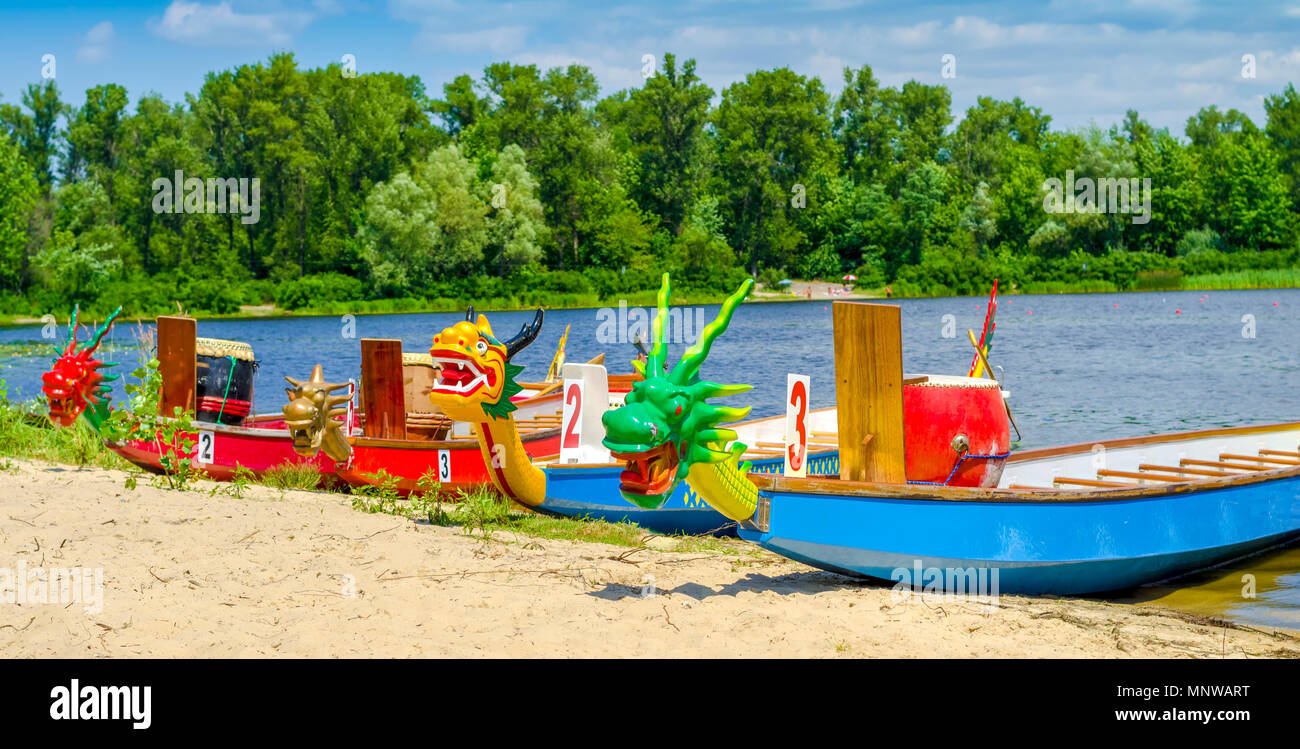 Decorated dragon boats are anchored on the river Stock Photo - Alamy