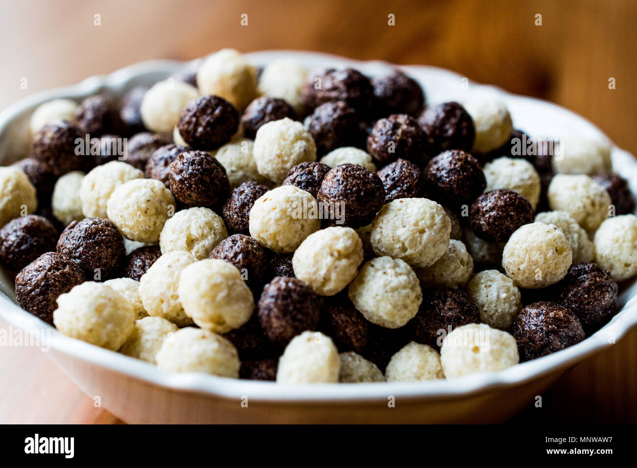 Chocolate Cereal balls in bowl. Breakfast Concept Stock Photo - Alamy