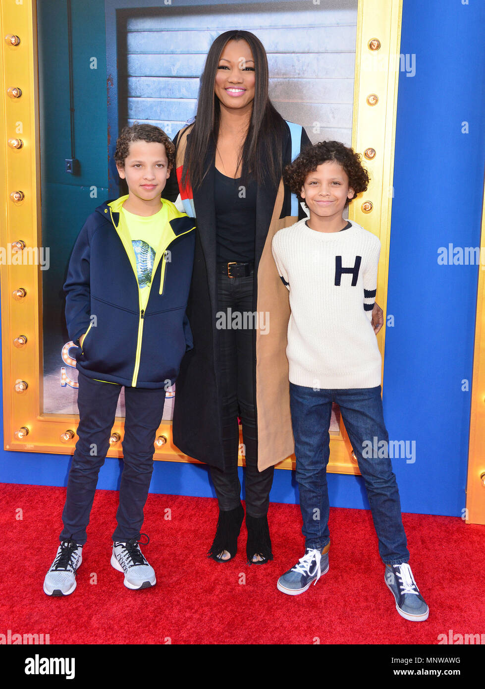 Garcelle Beauvais, son Jaid and Jax at the Sing Premiere at the ...