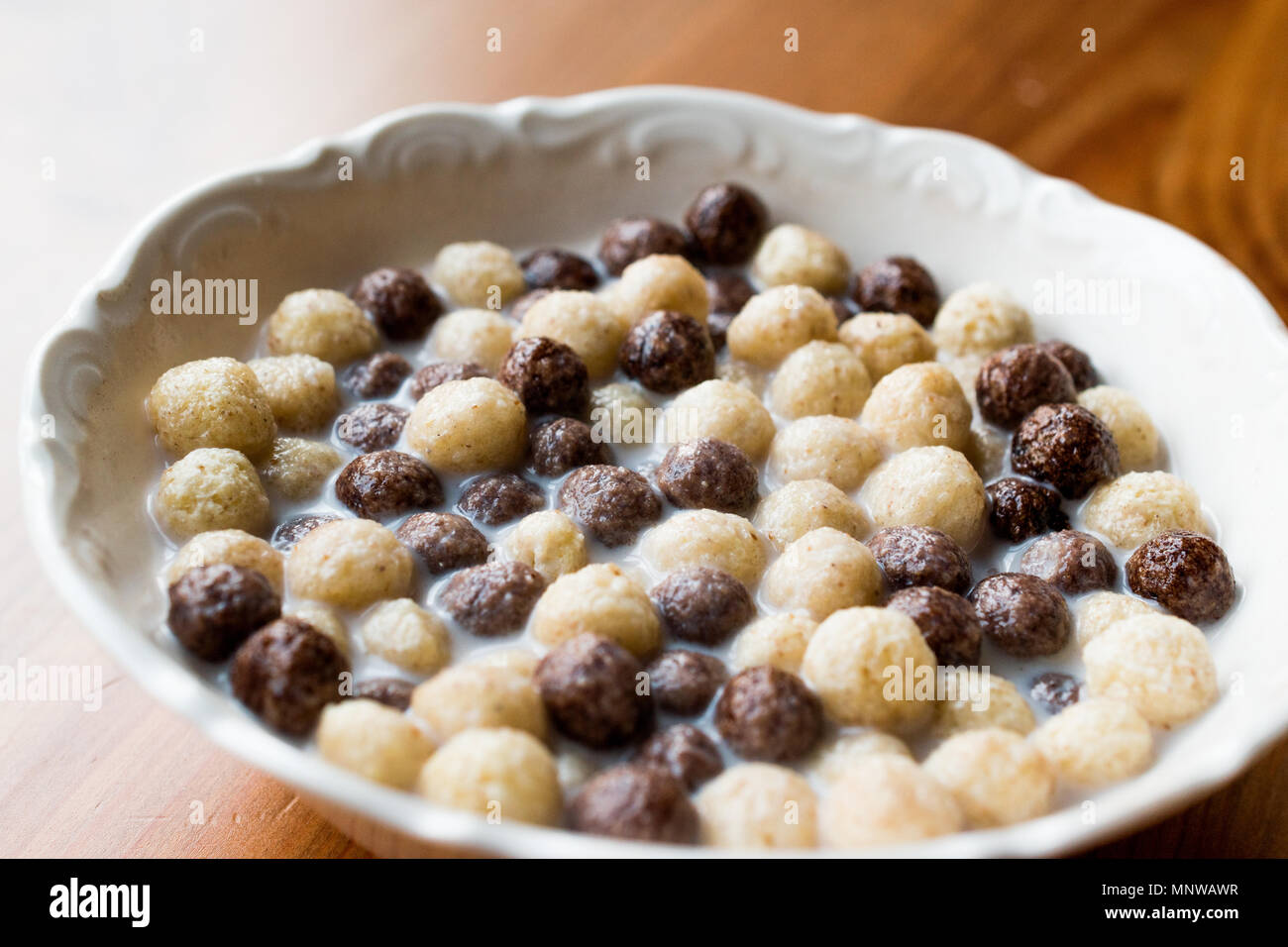 Chocolate Corn balls with milk. Breakfast Concept Stock Photo - Alamy