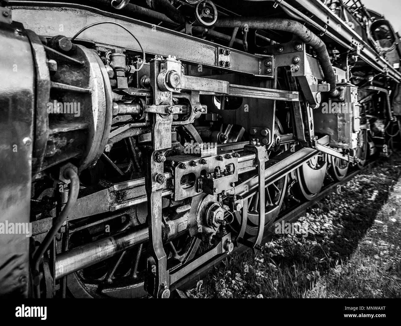 Wheels of an old steam locomotive, black and white image Stock Photo - Alamy