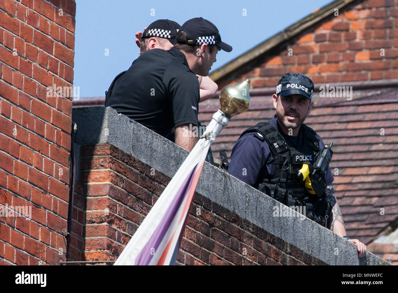 Windsor, UK. 19th May, 2018. Police snipers on a rooftop above the High ...