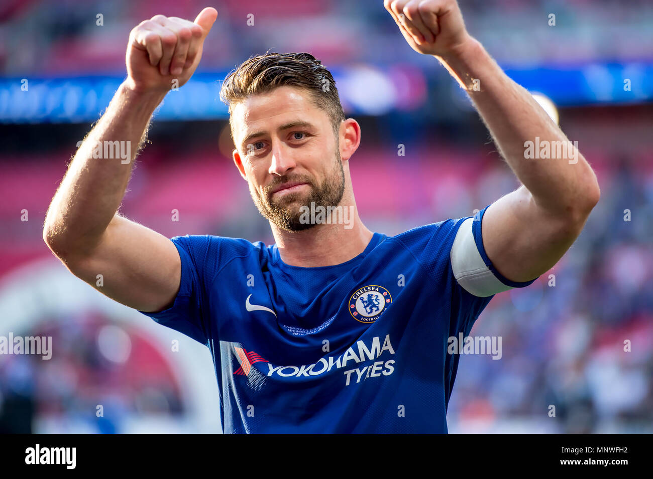Gary Cahill of Chelsea celebrates the victory with his thumbs up ...
