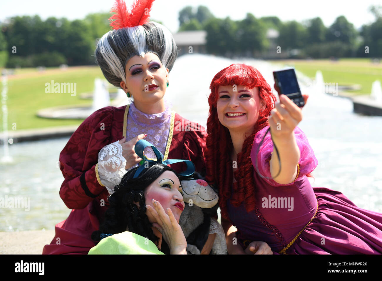 Dusseldorf, Germany. 20th May 2018. Three cosplayers take a selfie in ...