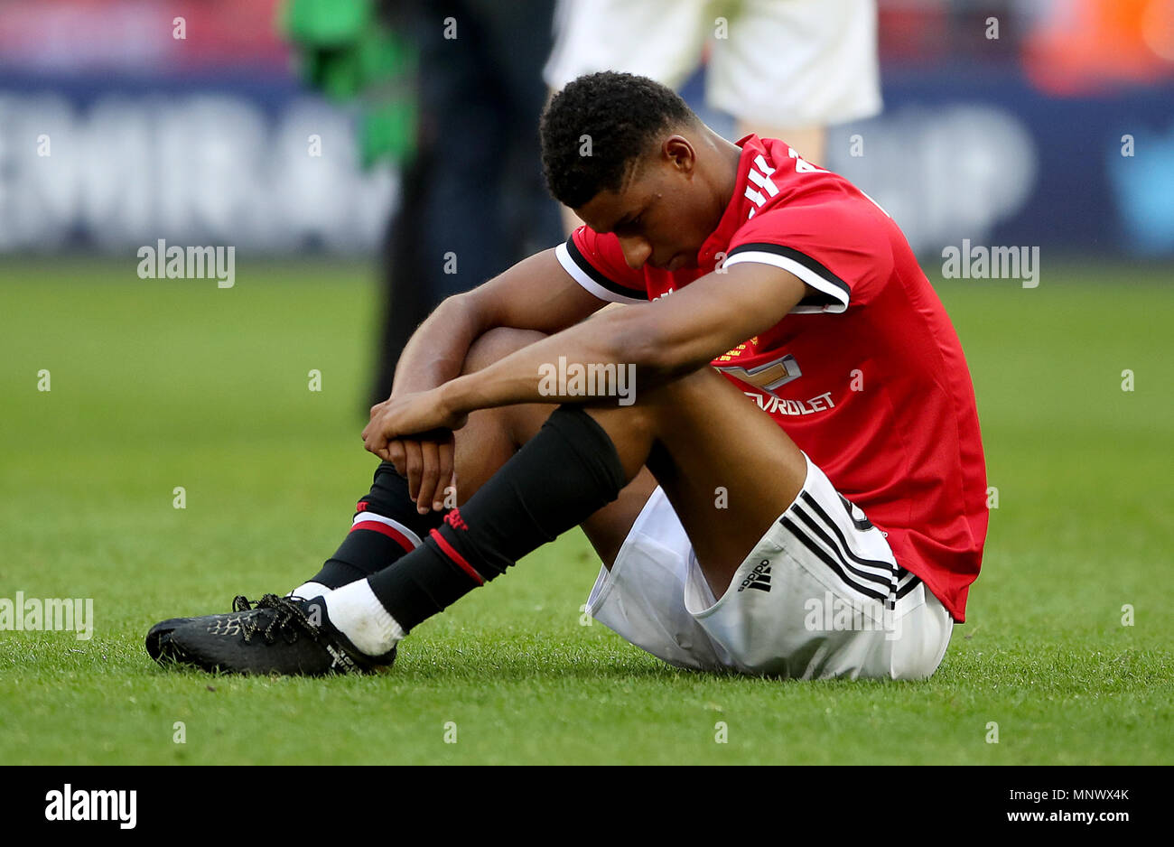 Manchester United's Marcus Rashford appears dejected after the Emirates ...
