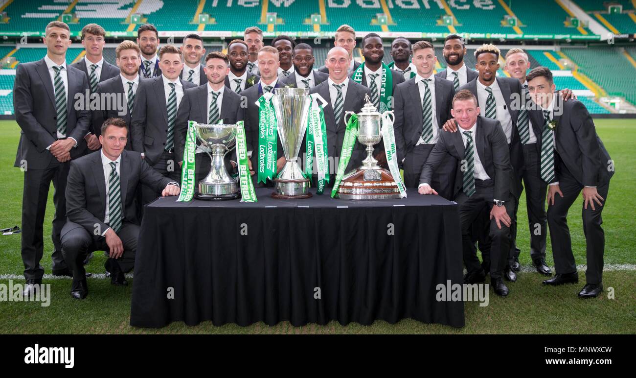 Celtic pose with the three trophies after the parade at Celtic Park ...