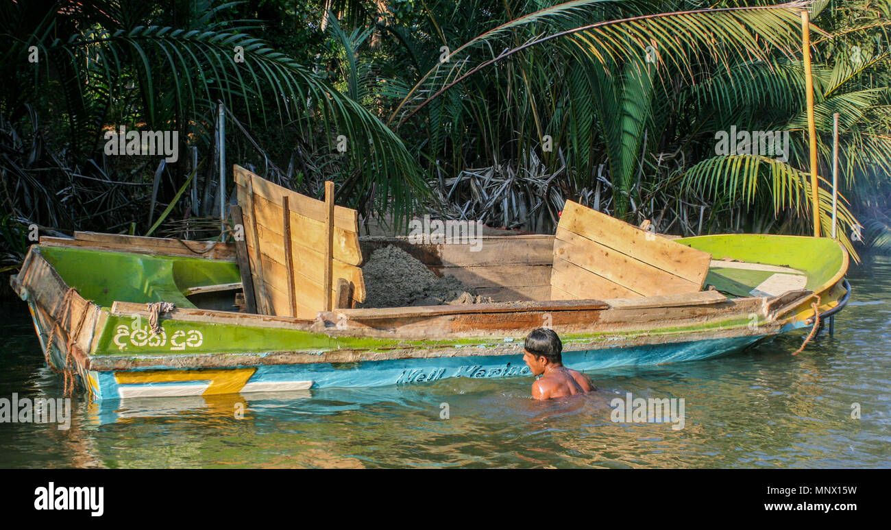 Sand mining from the river in Sri Lanka Stock Photo - Alamy