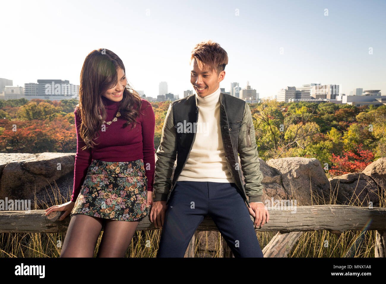 Young japanese couple dating outdoors Stock Photo - Alamy