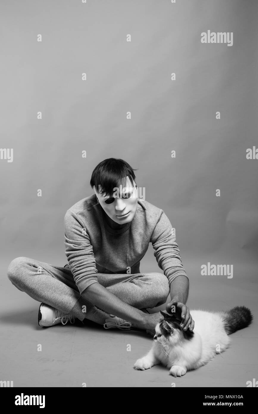 Young man in white long Black and White Stock Photos & Images - Alamy