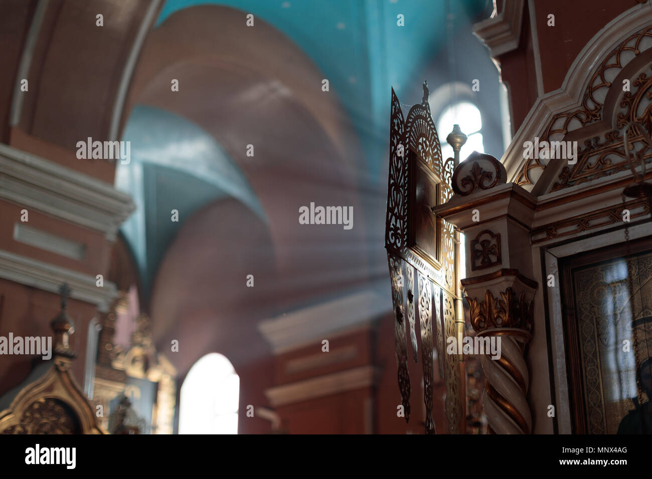 interior of the Orthodox Russian church lit by light from the window ...