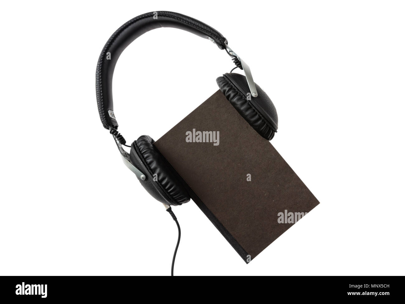 Audio book concept. Black book and headphones set isolated on white ...