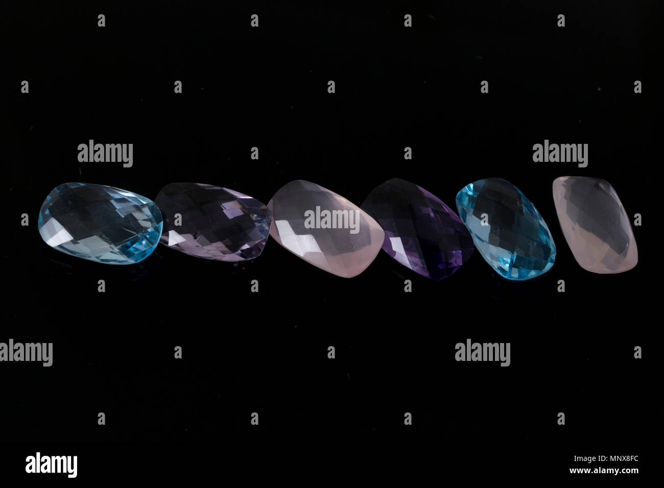Precious and colored stones Stock Photo - Alamy