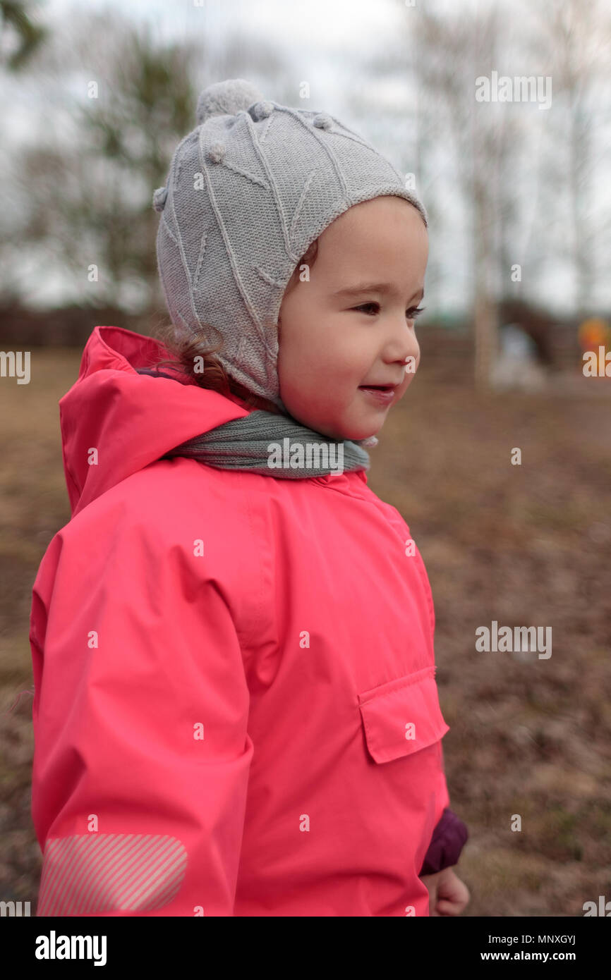 cute and little positive child on the street Stock Photo - Alamy