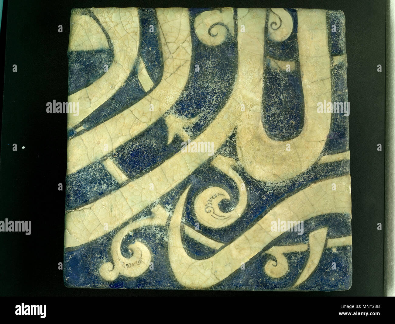 A Kashan Moulded Tile with Inscription (1300 - 1325). 1215 Unknown ...
