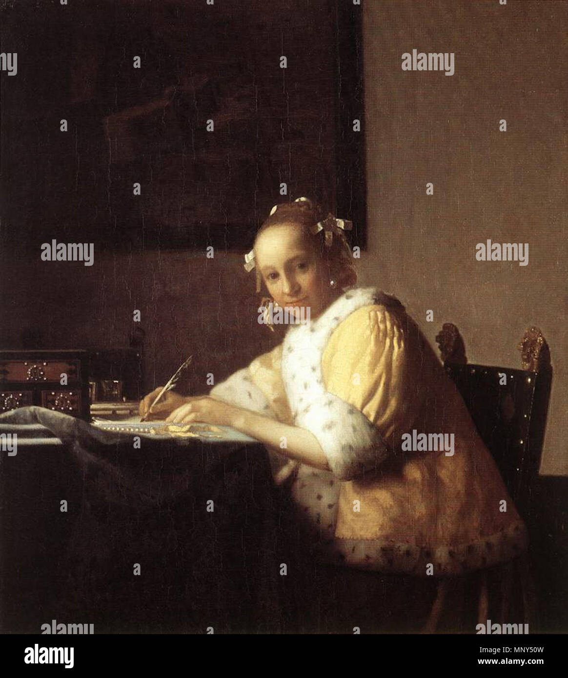 A lady writing circa 1665. 1230 Vermeer A Lady Writing Stock Photo - Alamy