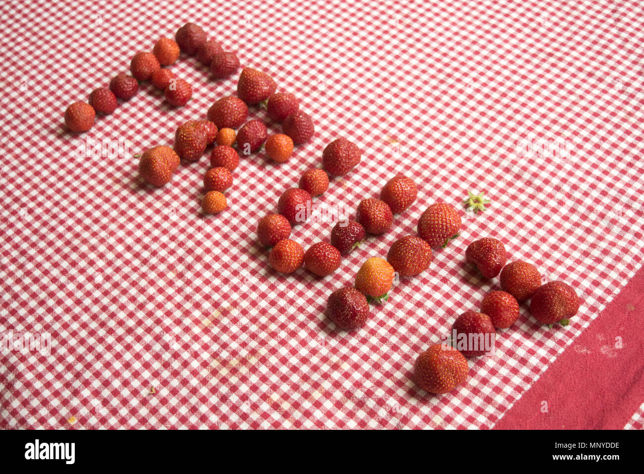 fruit written with fresh strawberries Stock Photo - Alamy