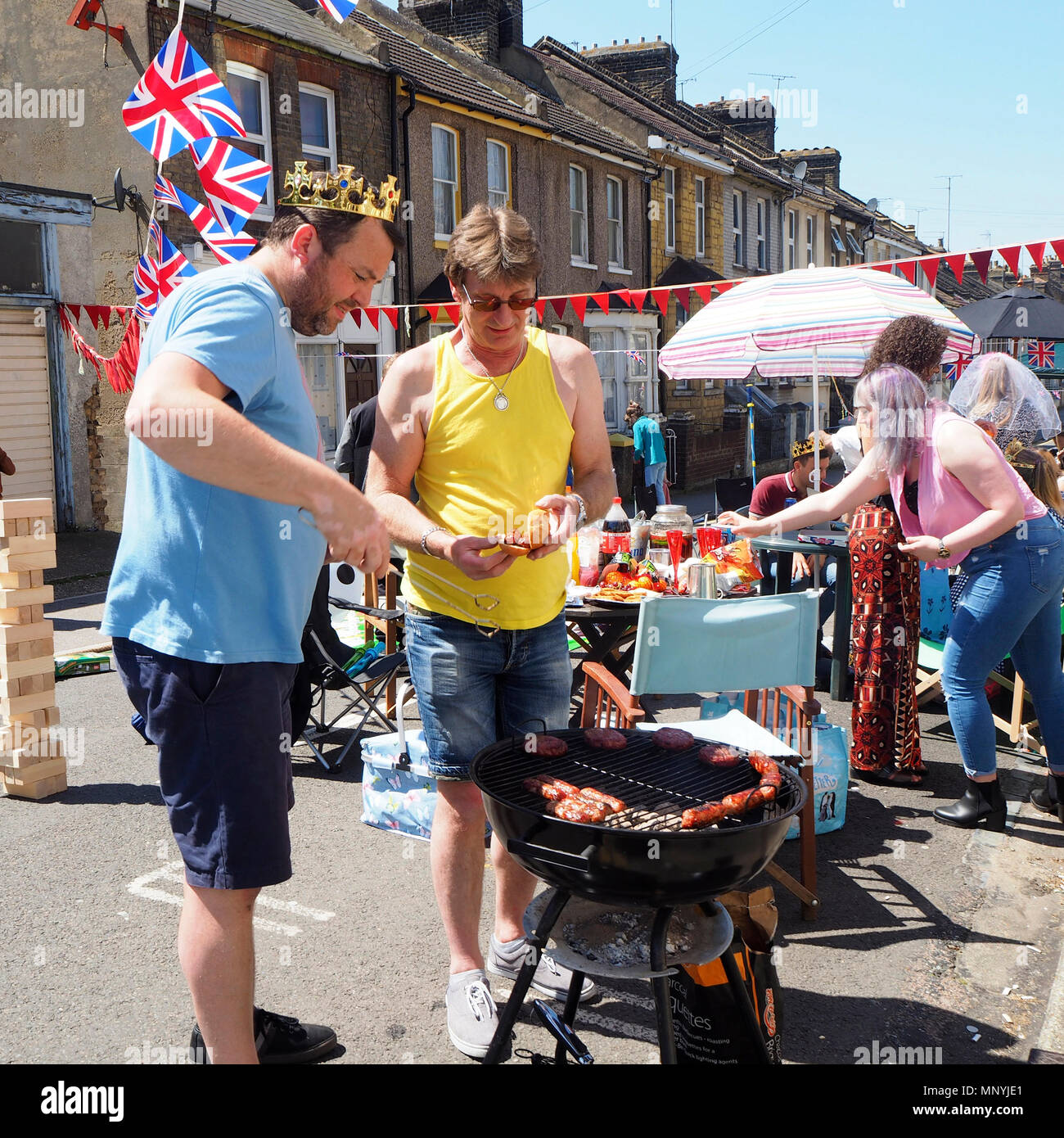 Food being prepared at a royal wedding street party celebrating Harry ...
