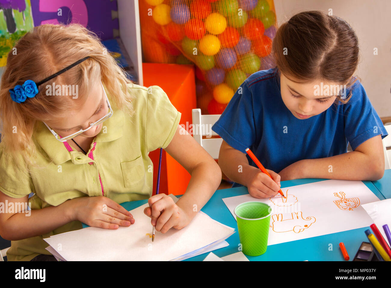 Small students children painting in art school class Stock Photo - Alamy