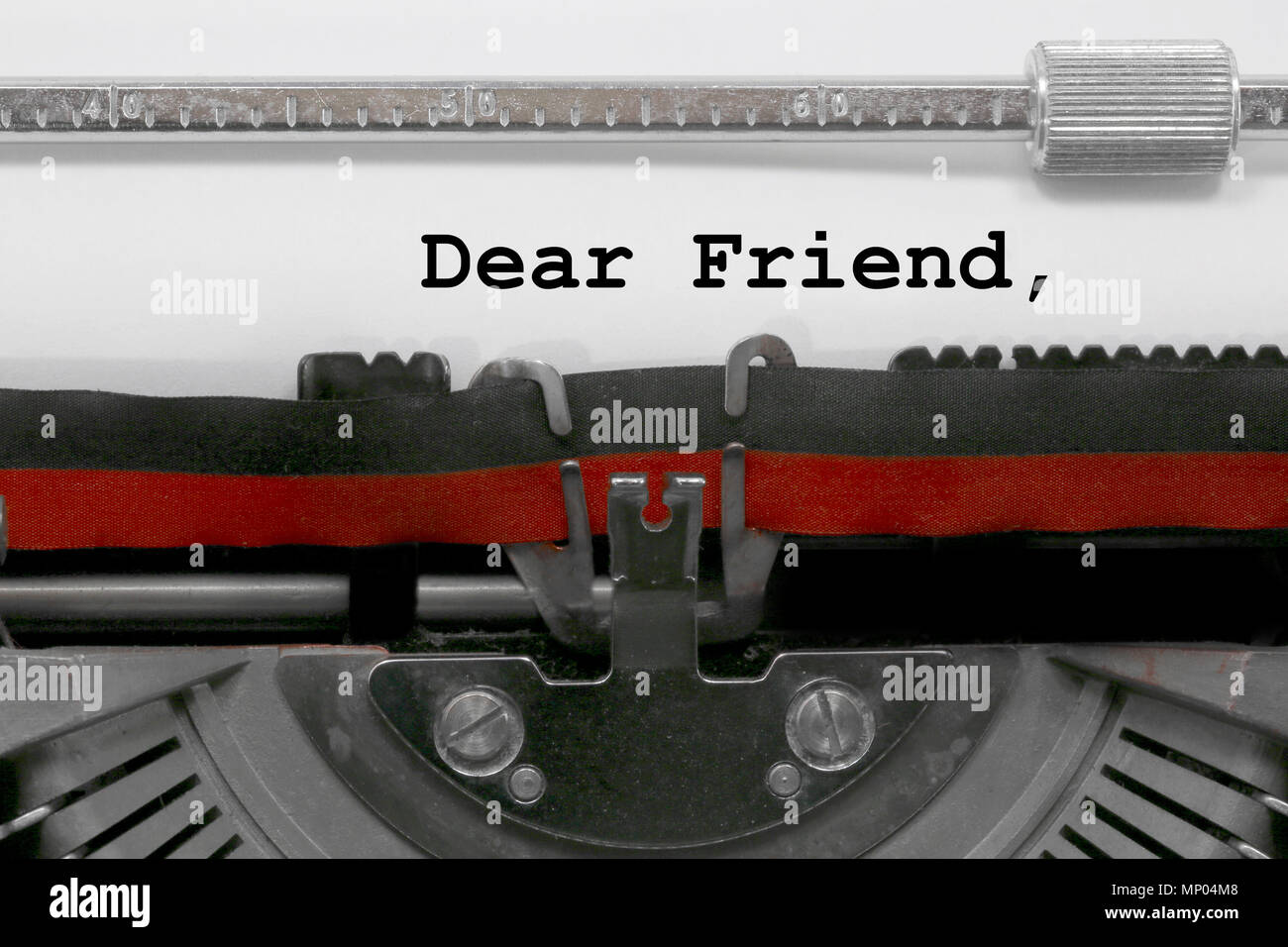 Dear friend text written by an old typewriter on white sheet Stock ...