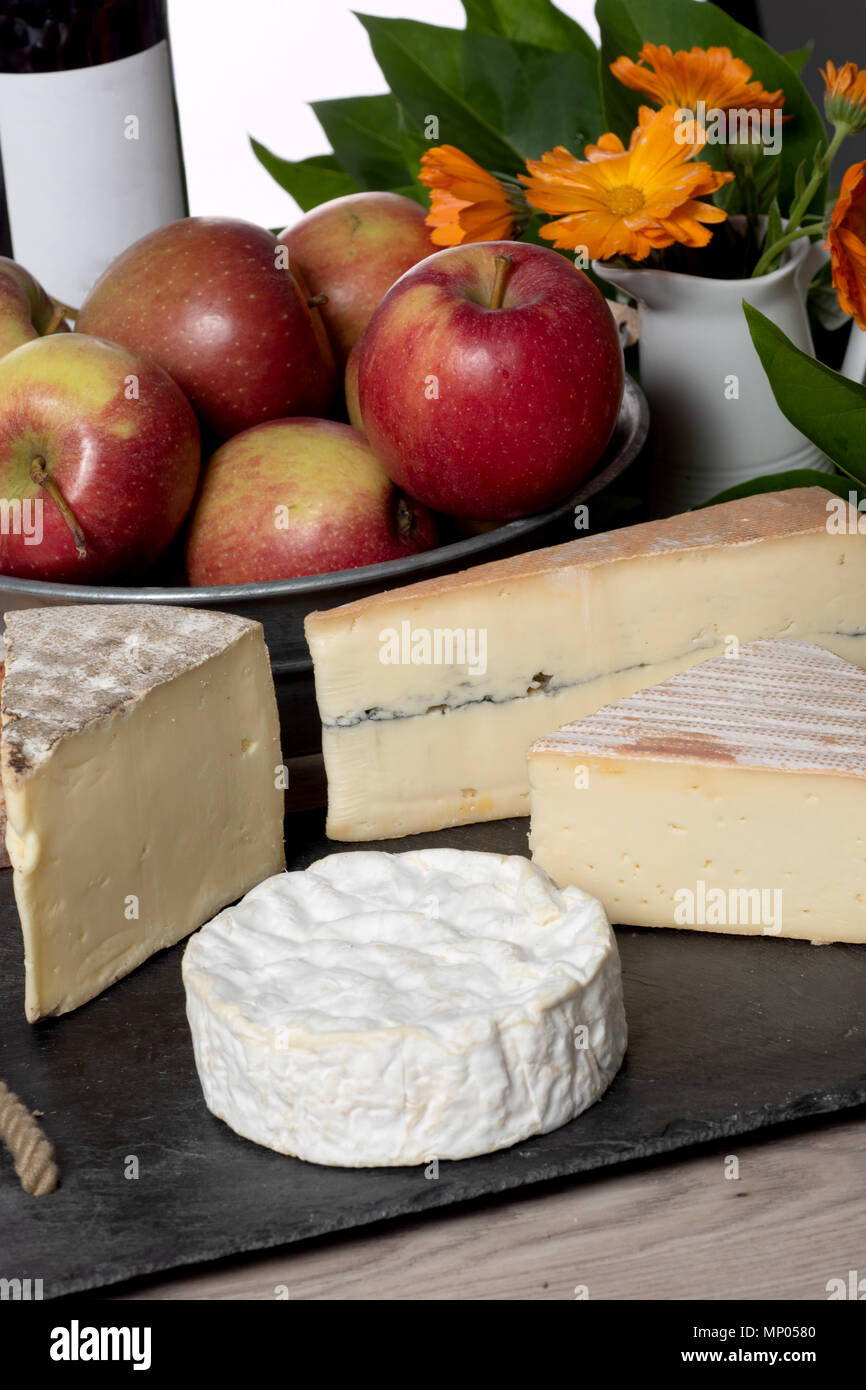 a Normandy camembert with other cheeses Stock Photo - Alamy