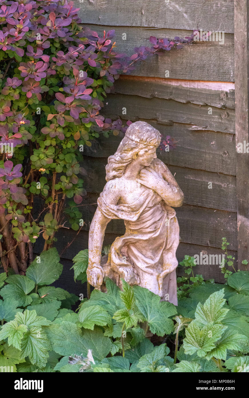Garden statue classical lady Stock Photo - Alamy