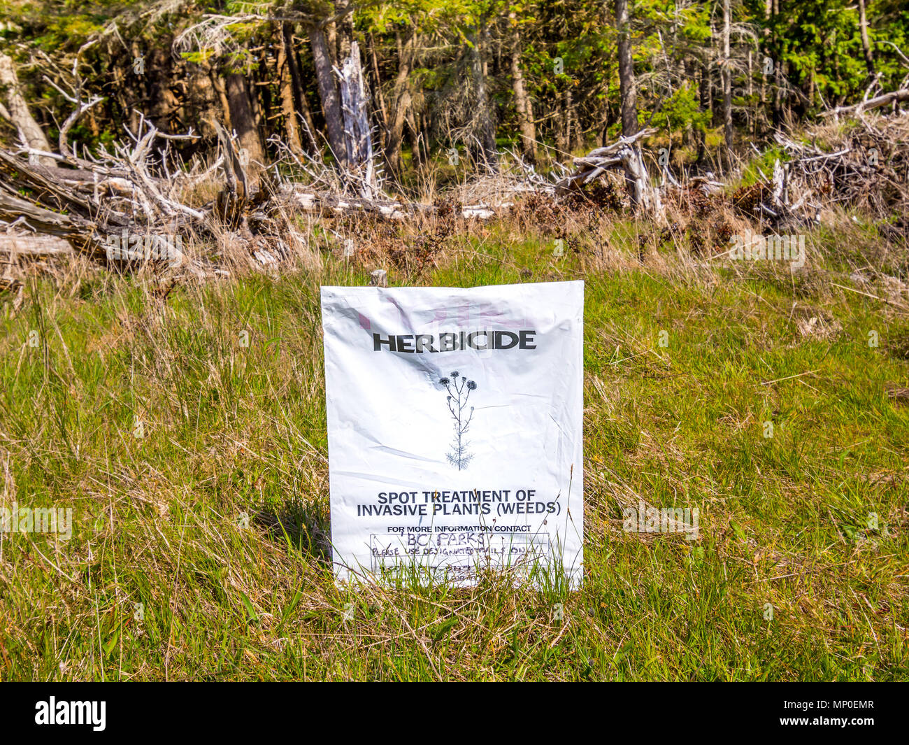 Herbicide warning notice on sprayed weeds, Helliwell Provincial Park ...