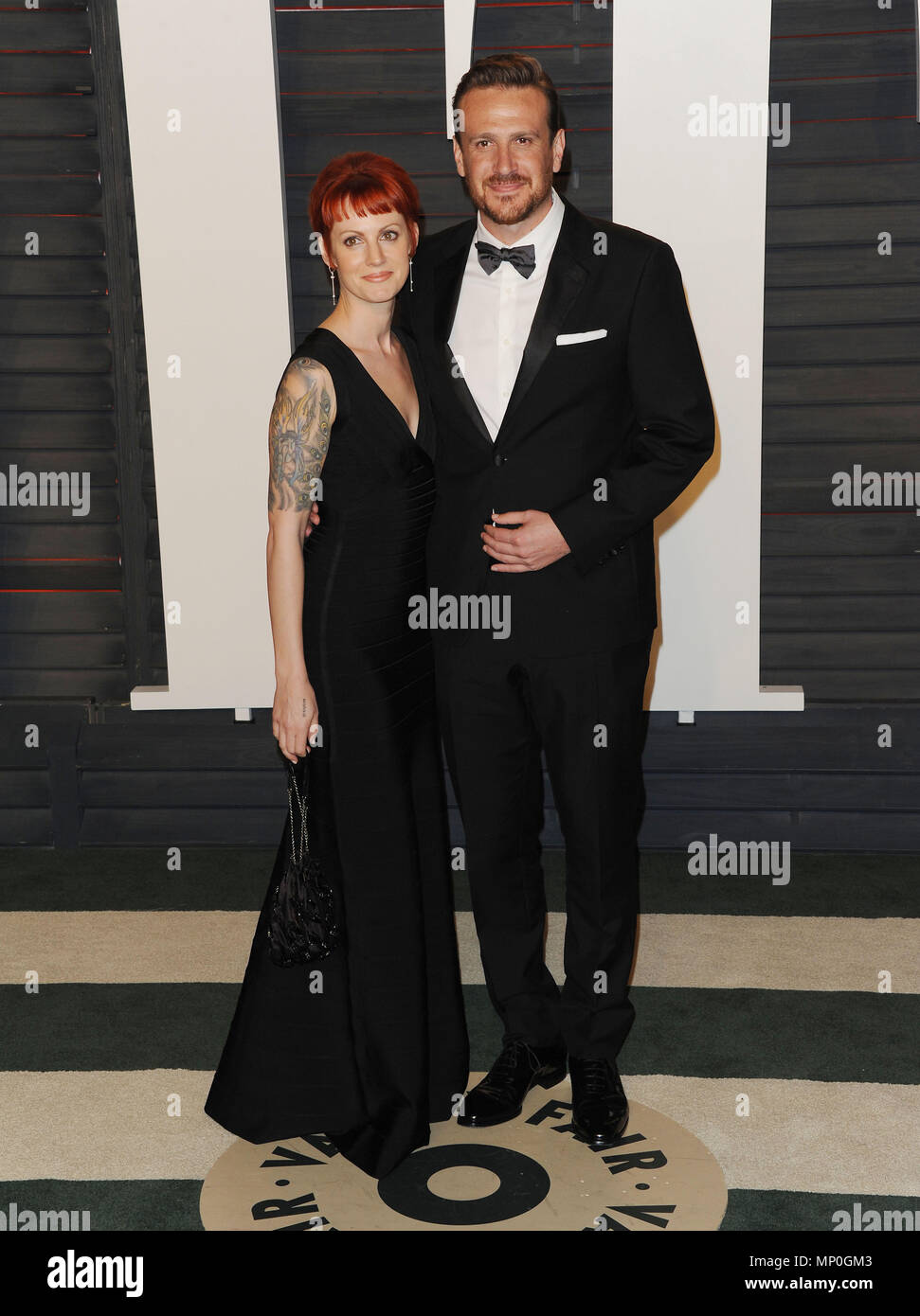 Jason Segel, Alexis Minter arriving at the Vanity Fair's Oscar Party ...