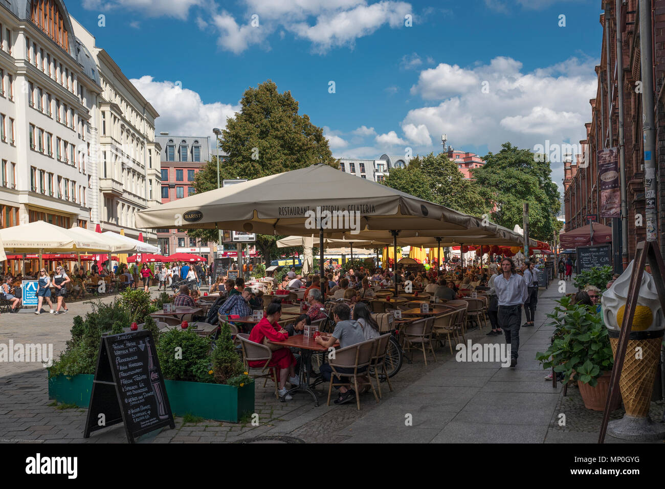 Berlin, Germany. Hackescher Markt area open-air Restaurants, Parasols ...