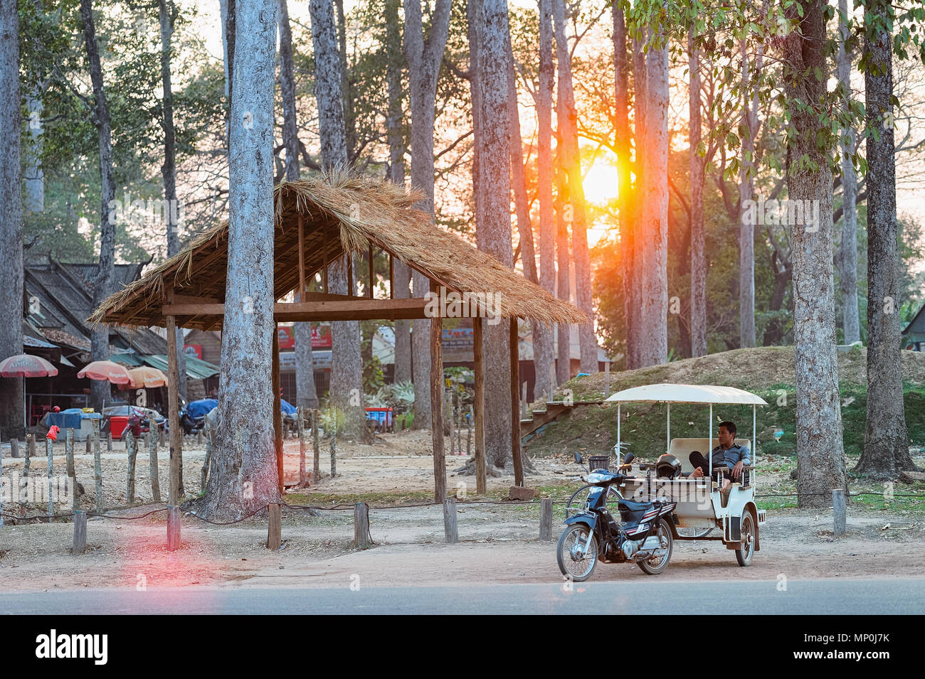 Siem Reap, Cambodia - March 3, 2016: Taxi rickshaw at Angkor Wat temple ...