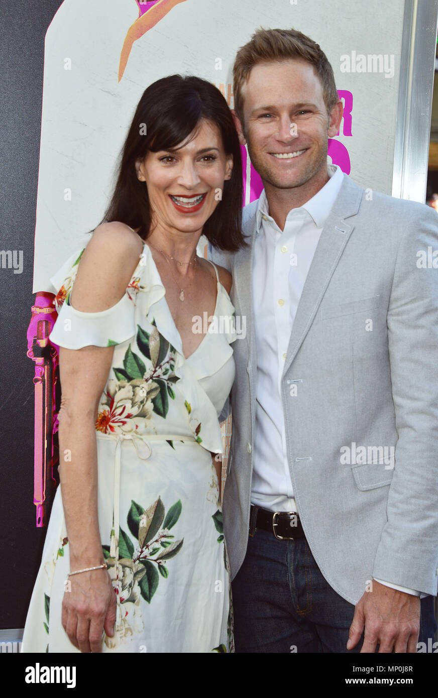 Perrey Reeves and husband at the War Dogs Premiere at the TCL Chinese ...
