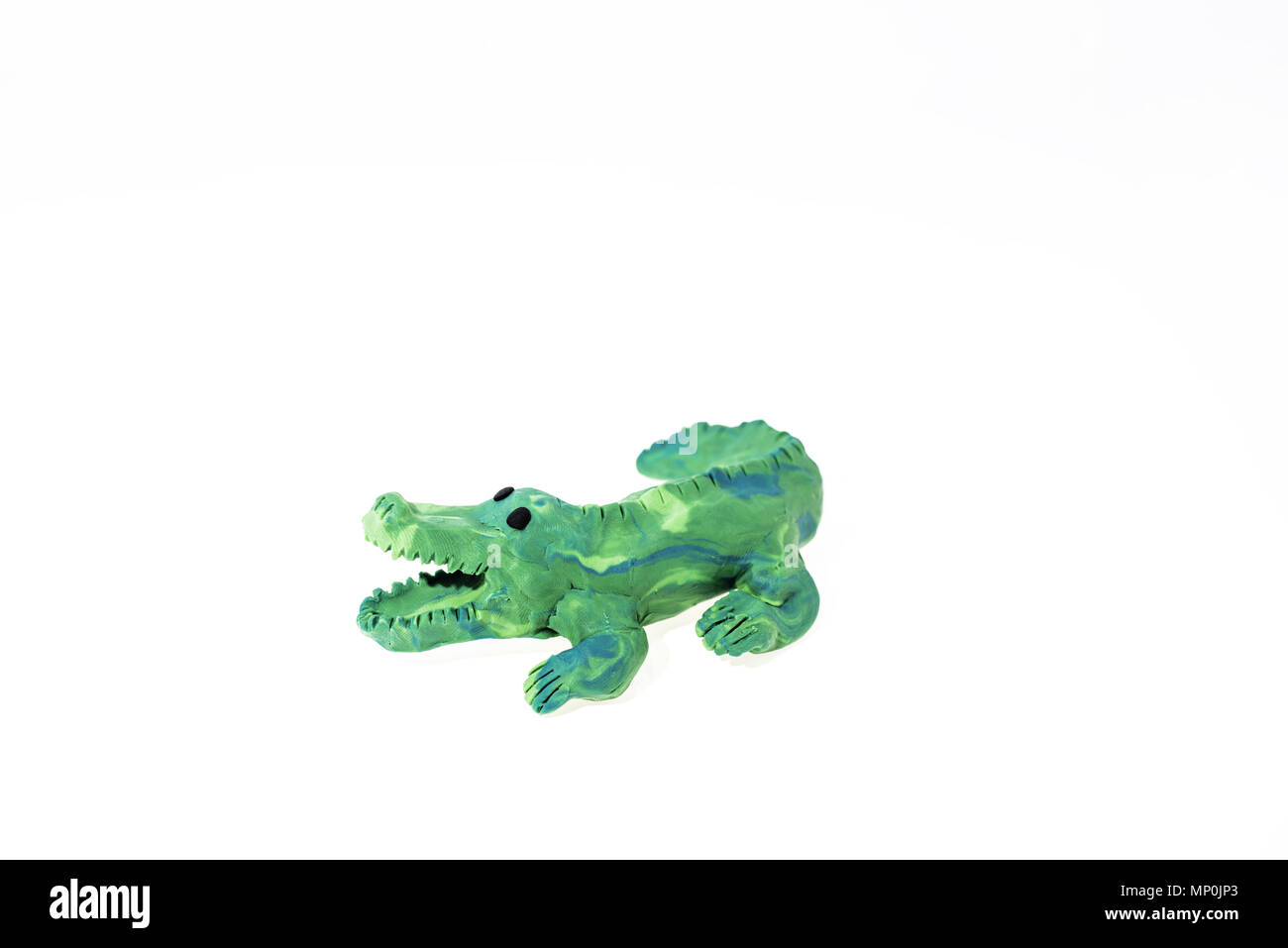 Plasticine artwork. Handmade crocodile. Abstract isolated photo Stock ...
