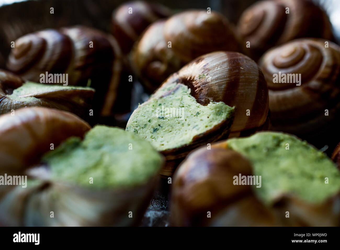 Frozen Snail food with Garlic Butter. Organic Food Stock Photo - Alamy
