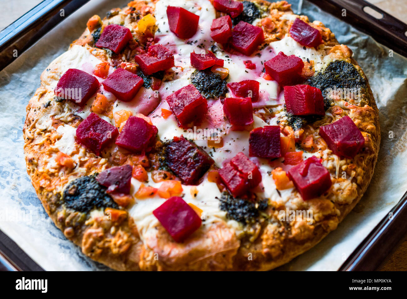 Vegan Beetroot Pizza with pesto sauce. Organic Food Stock Photo - Alamy