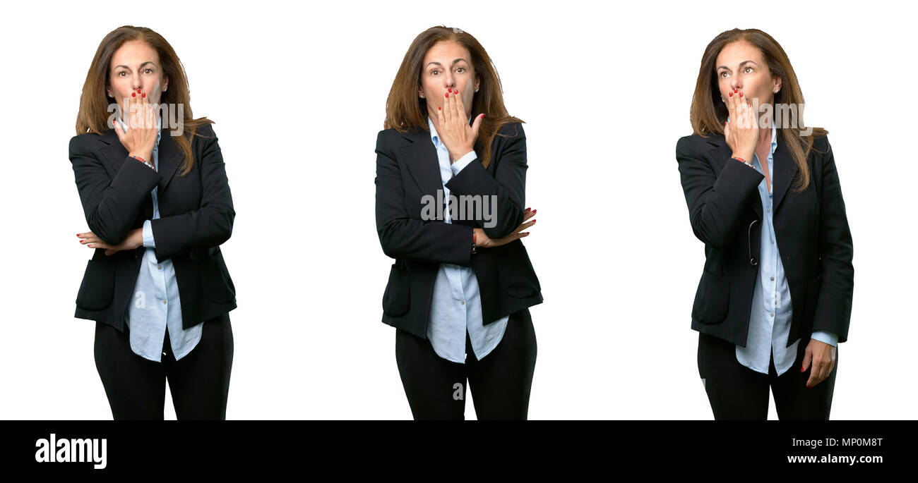 Middle age business woman covers mouth in shock, looks shy, expressing ...