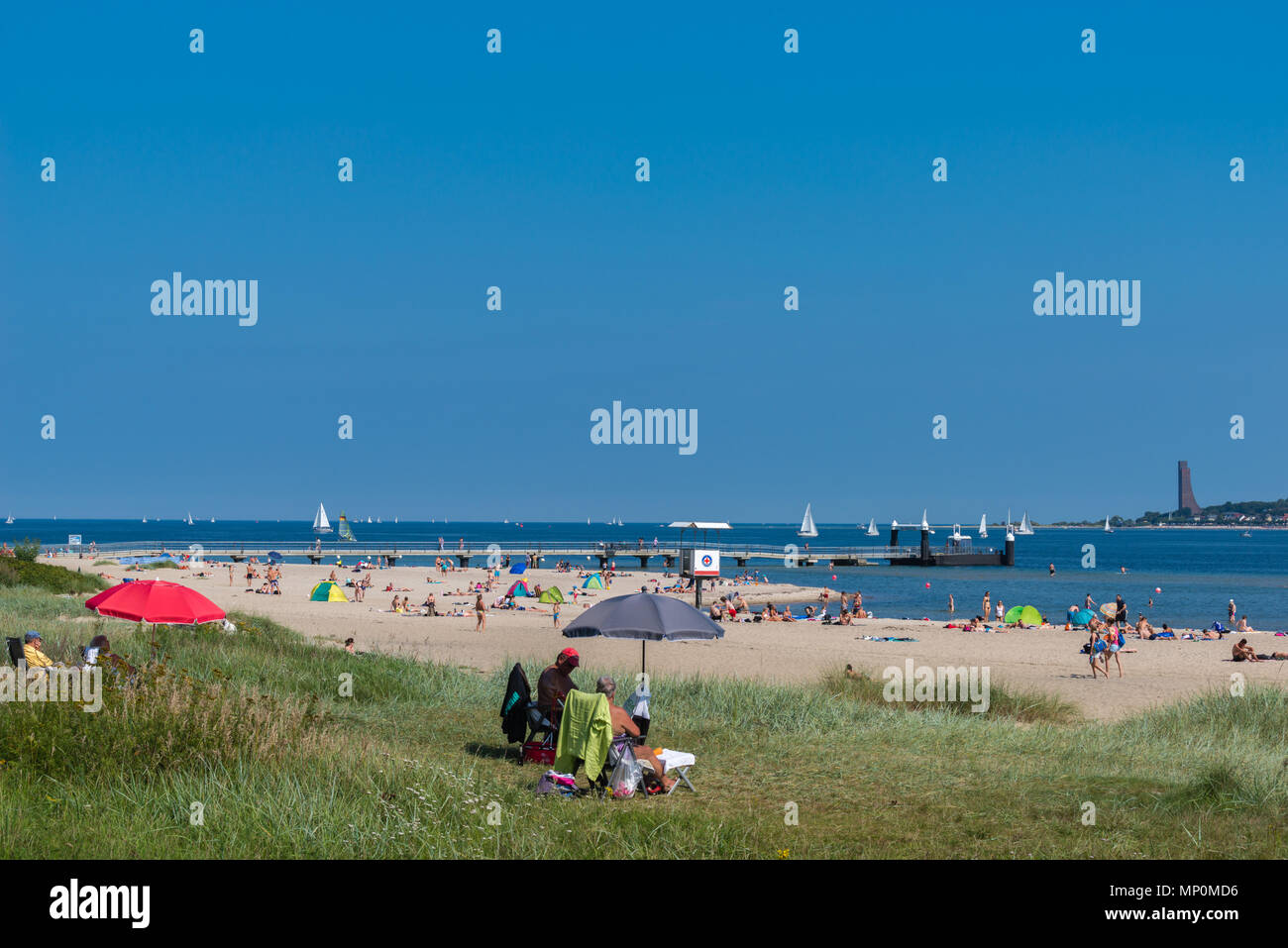 Relaxing on a hot summer day at the beach "Falkensteiner Strand", Kiel ...