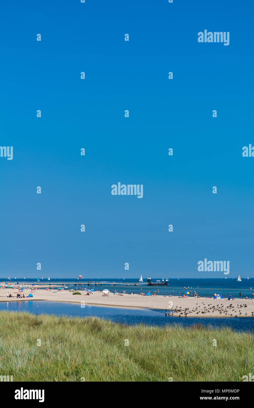 Relaxing on a hot summer day at the beach "Falkensteiner Strand", Kiel ...
