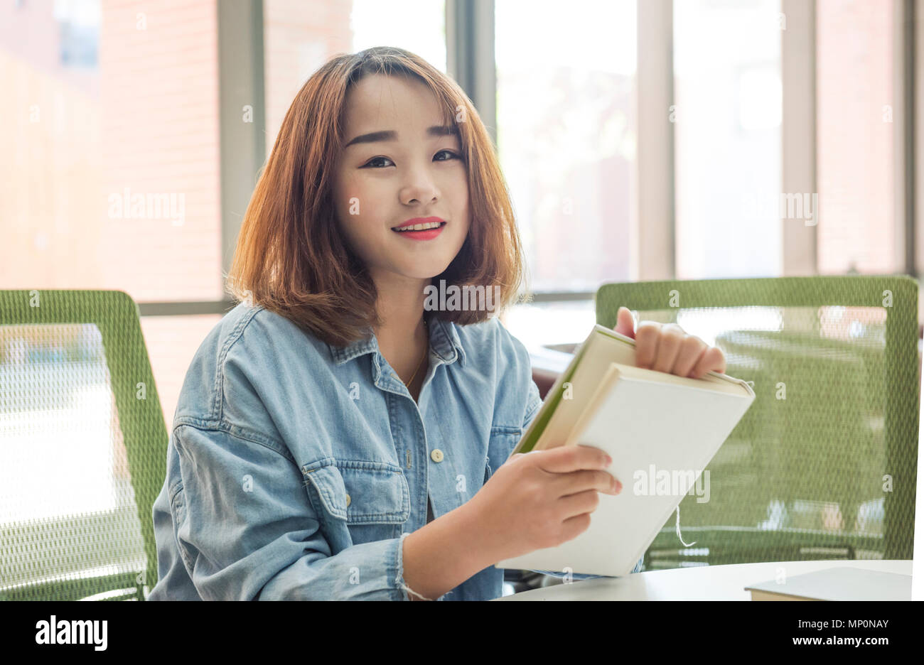 Asian student studying. A portrait of college student at campus Stock ...