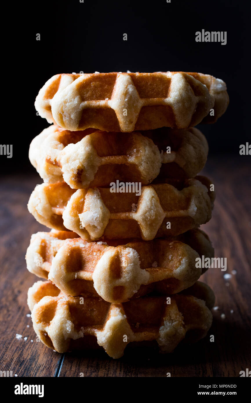 Stack of Plain Belgium Waffle on wooden surface. Traditional Food Stock ...
