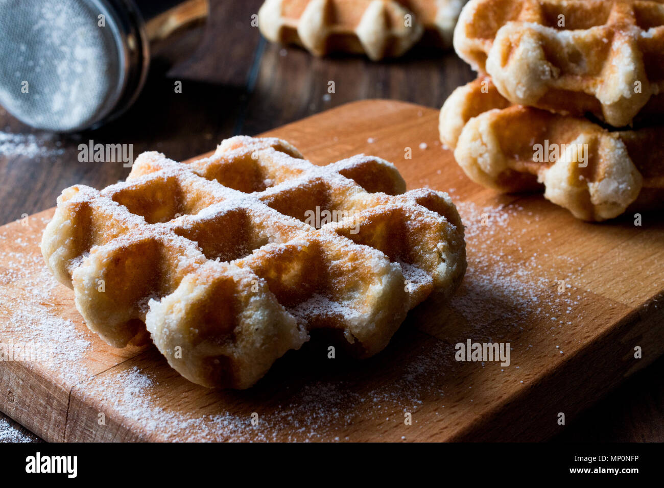 Belgium Waffle with Powdered Sugar. Traditional Food Stock Photo - Alamy