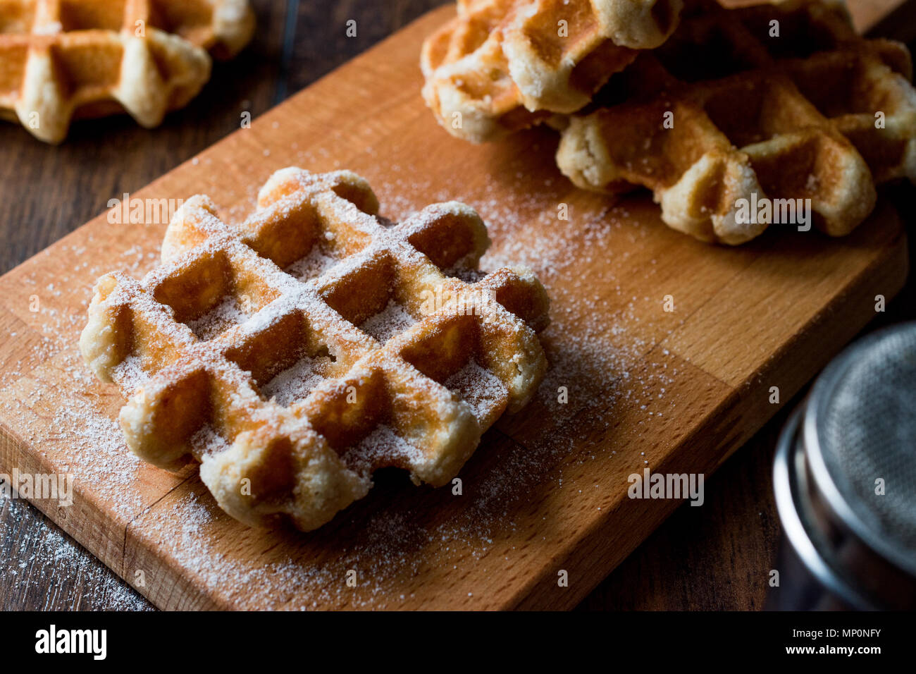 Belgium Waffle with Powdered Sugar. Traditional Food Stock Photo - Alamy