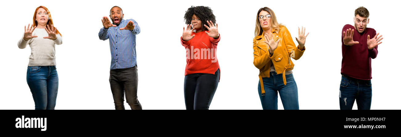 Group of cool people, woman and man disgusted and angry, keeping hands ...