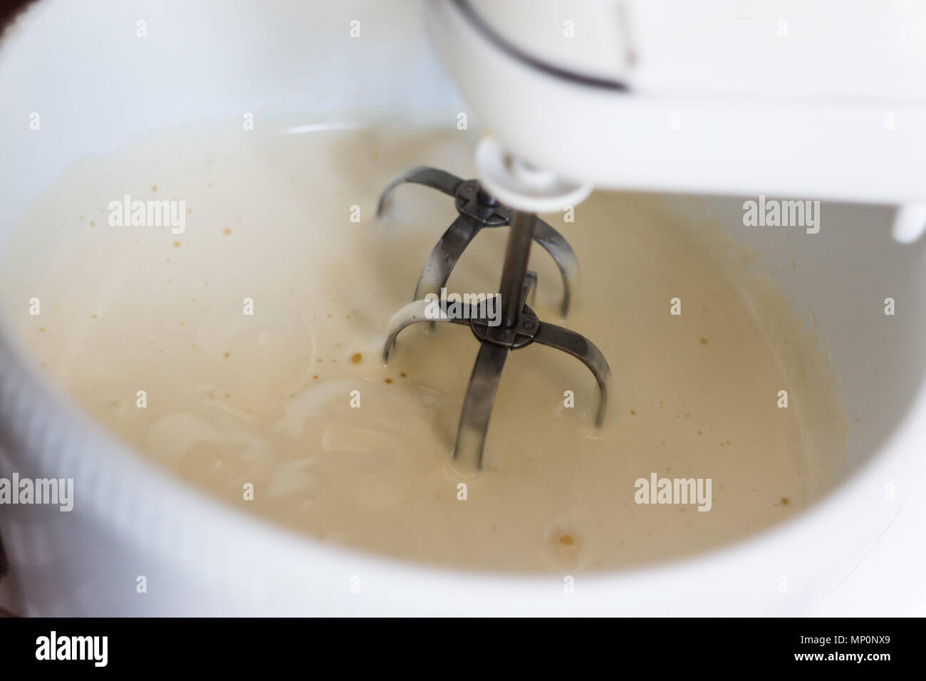 Making of a cream for home-made cakes on a mixer Stock Photo - Alamy