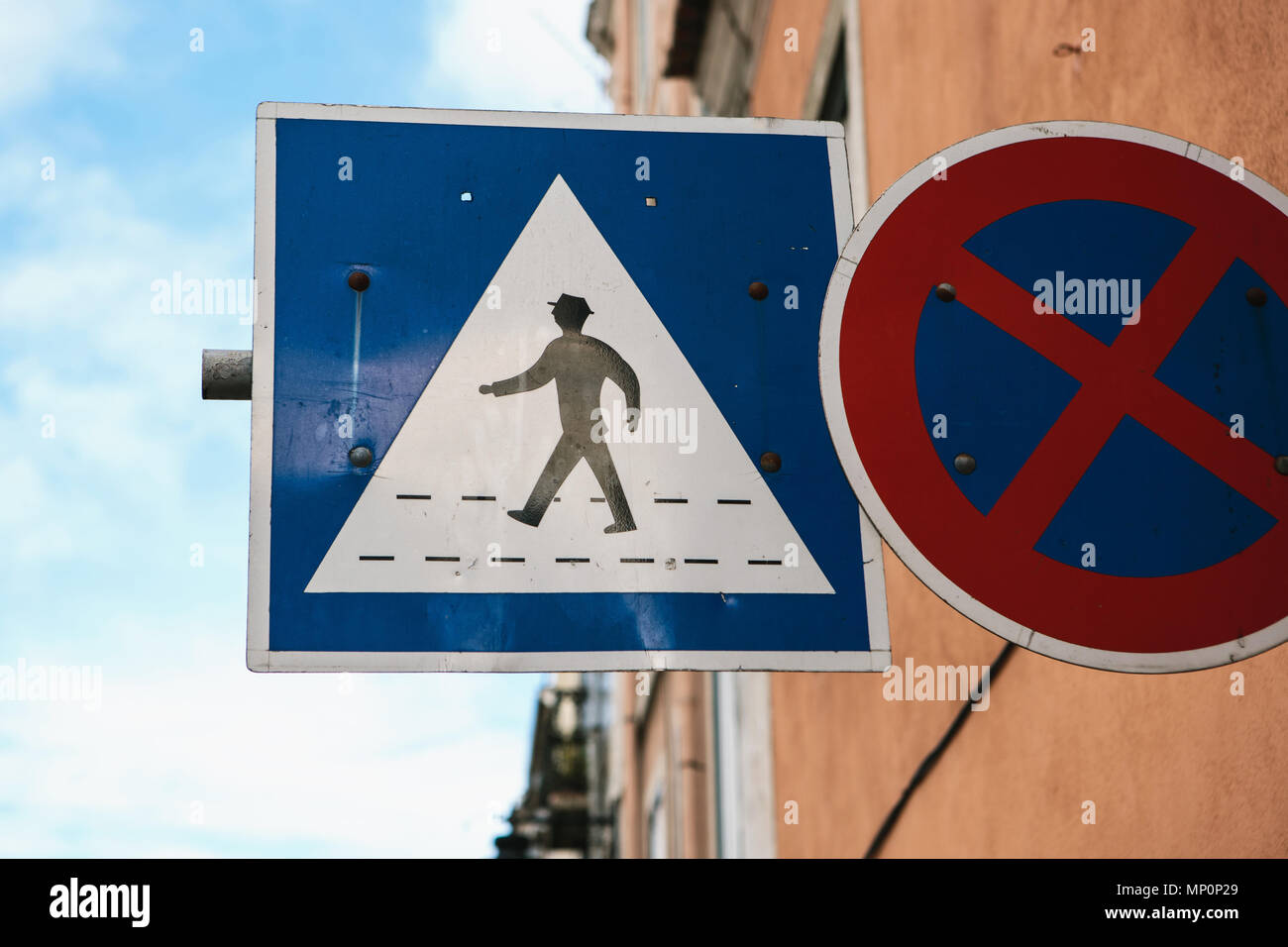 Crosswalk or sign for drivers. Sign or symbol parking is forbidden also ...