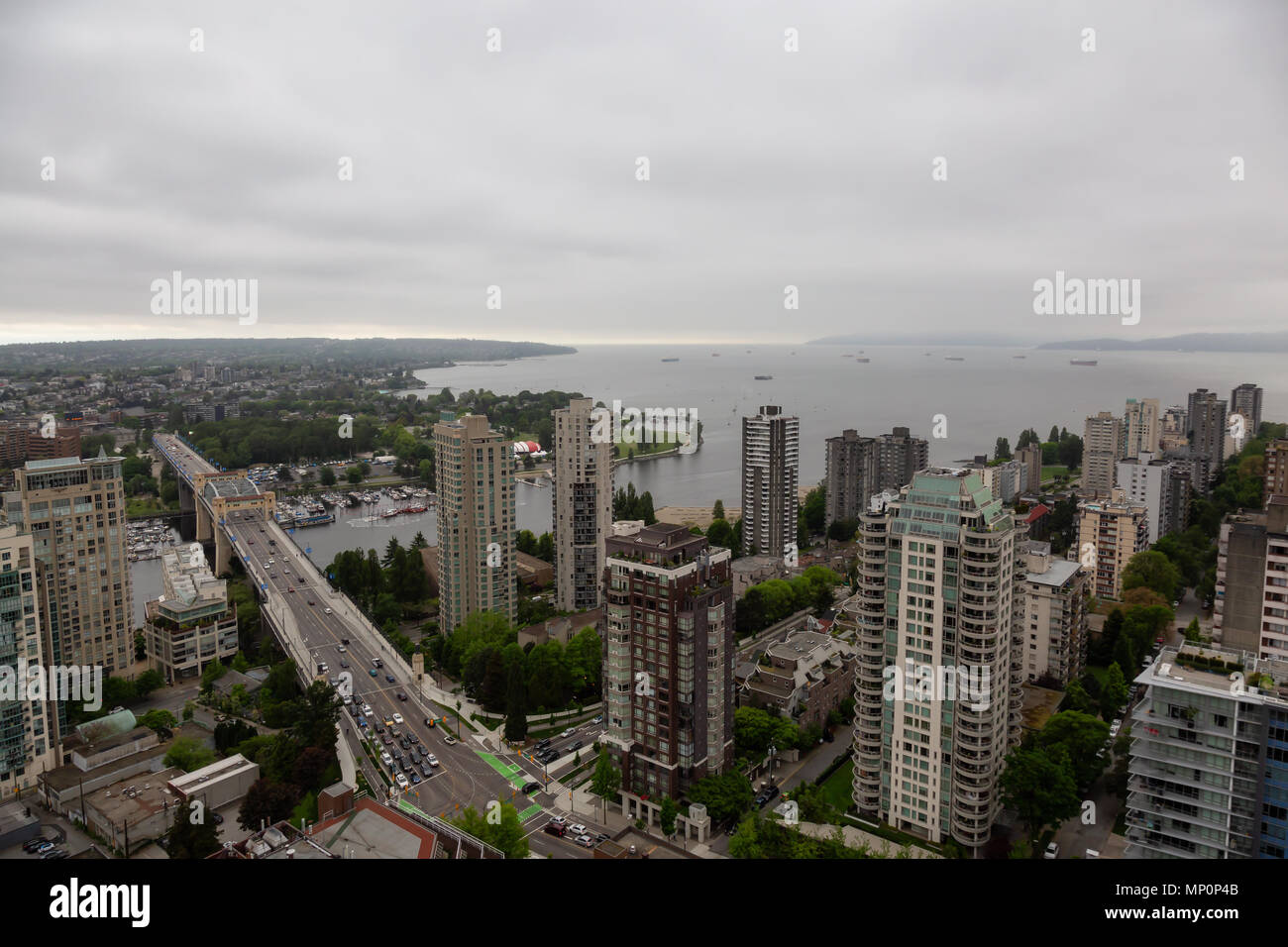 Beautiful aerial cityscape view during a vibrant cloudy and rainy day ...